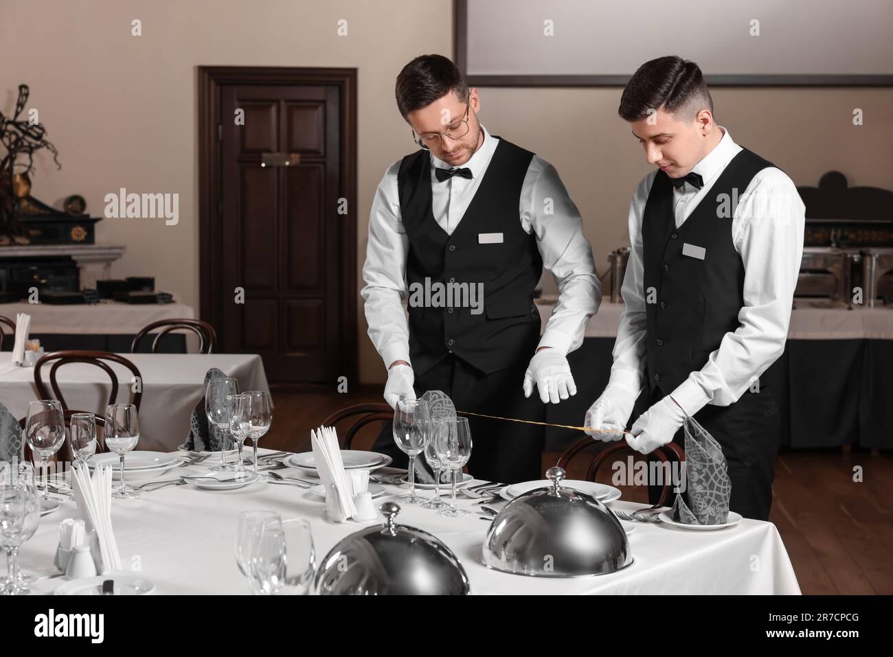 Man measuring table setting hi-res stock photography and images - Alamy
