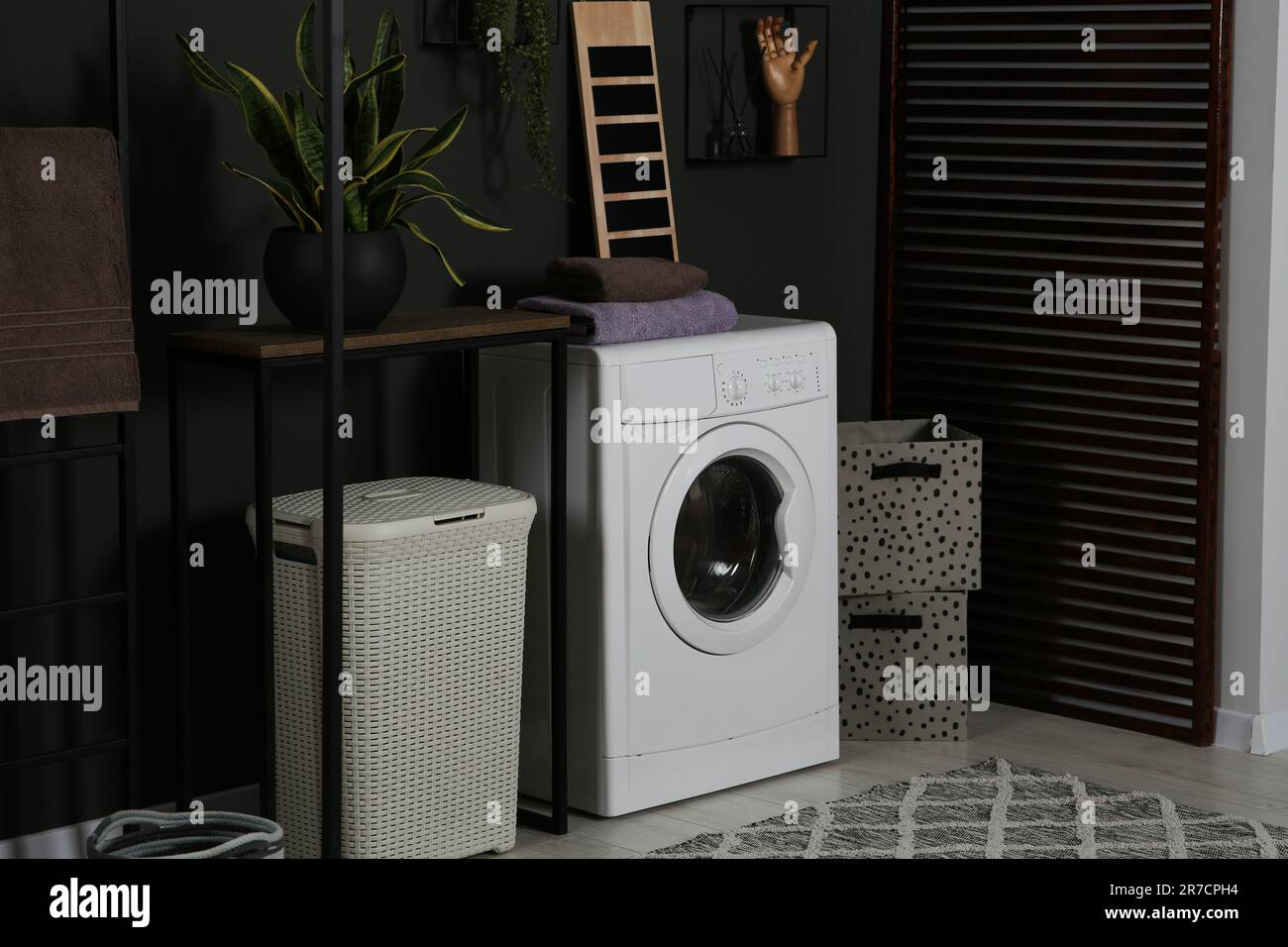 Stylish laundry room with washing machine. Interior design Stock Photo ...
