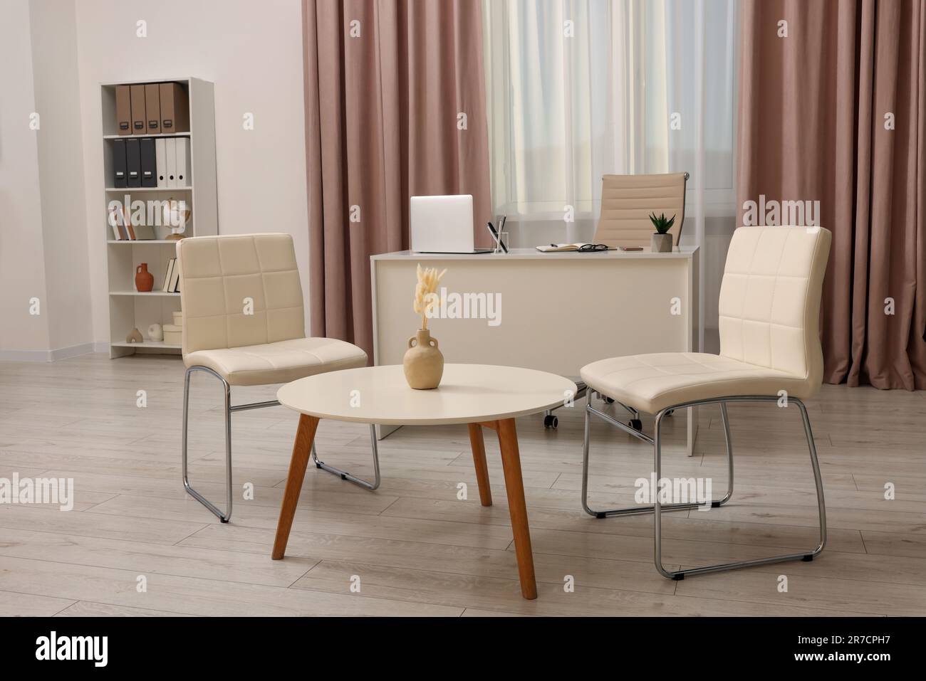 Modern office with comfortable waiting area and reception desk ...