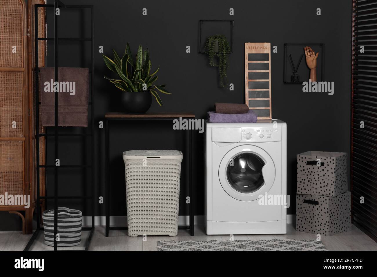 Stylish laundry room with washing machine. Interior design Stock Photo ...