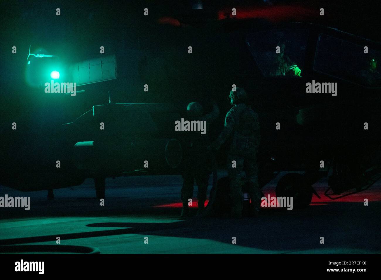 U.S. Air Force Airmen refuel an Apache AH-64 during Forward Air ...