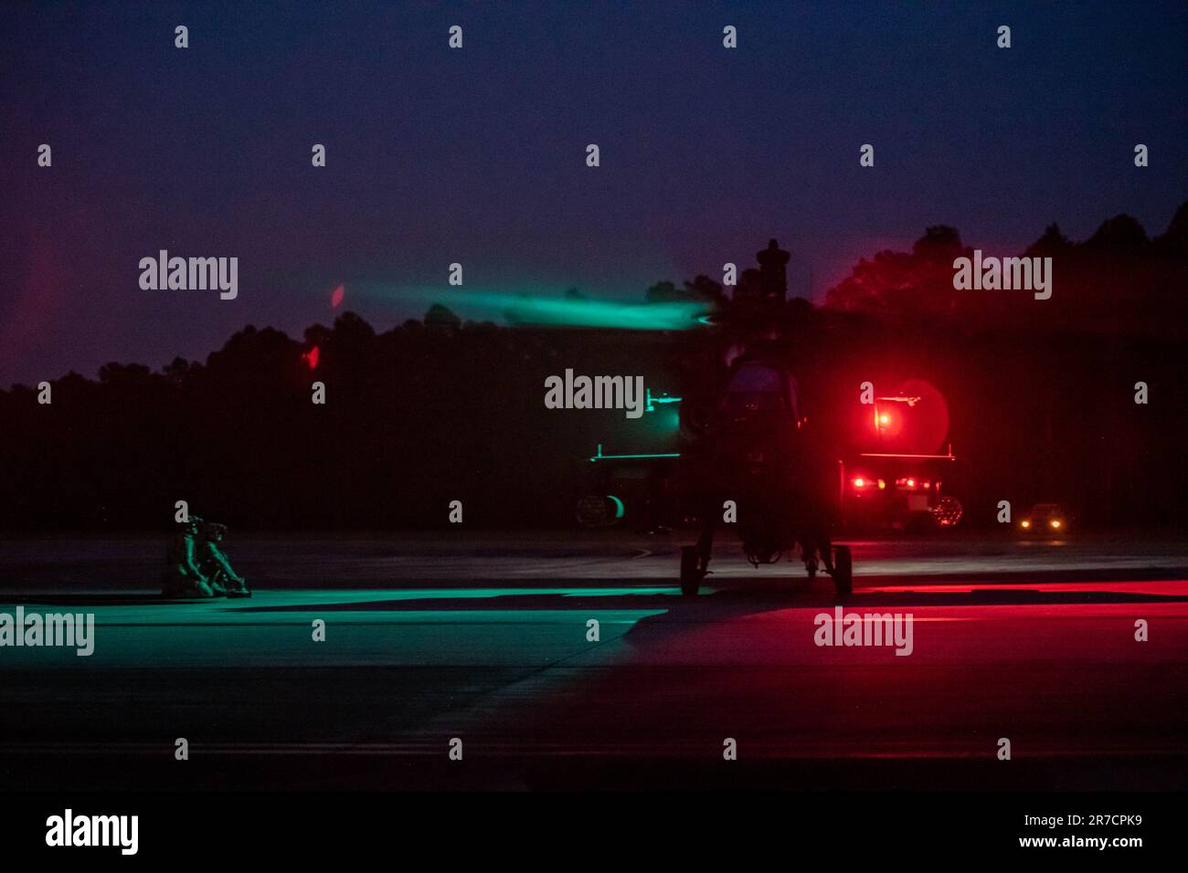 U.S. Air Force Airmen refuel an Apache AH-64 during Forward Air ...