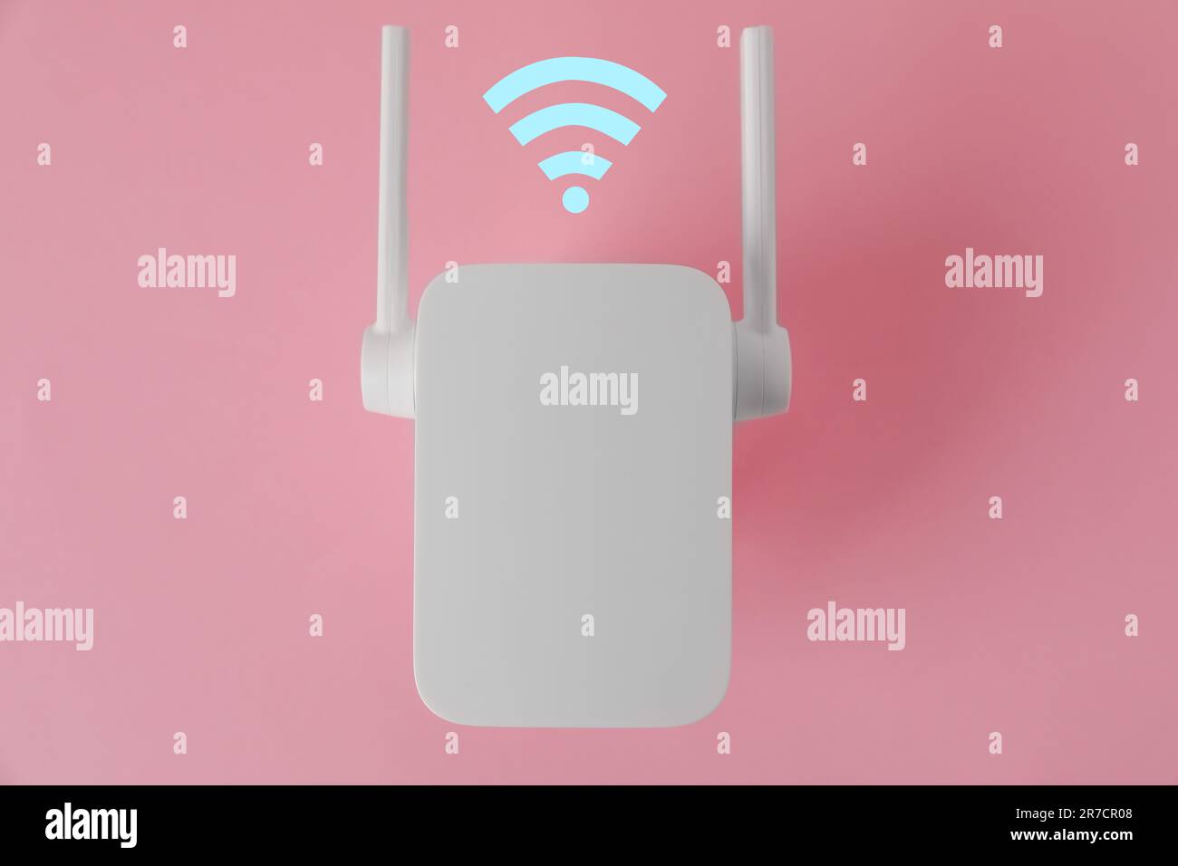 New modern repeater and Wi-Fi symbol on pink background Stock Photo - Alamy