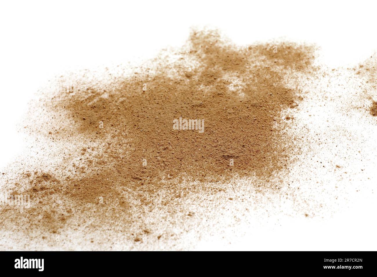 Pile of brown dust scattered on white background Stock Photo - Alamy