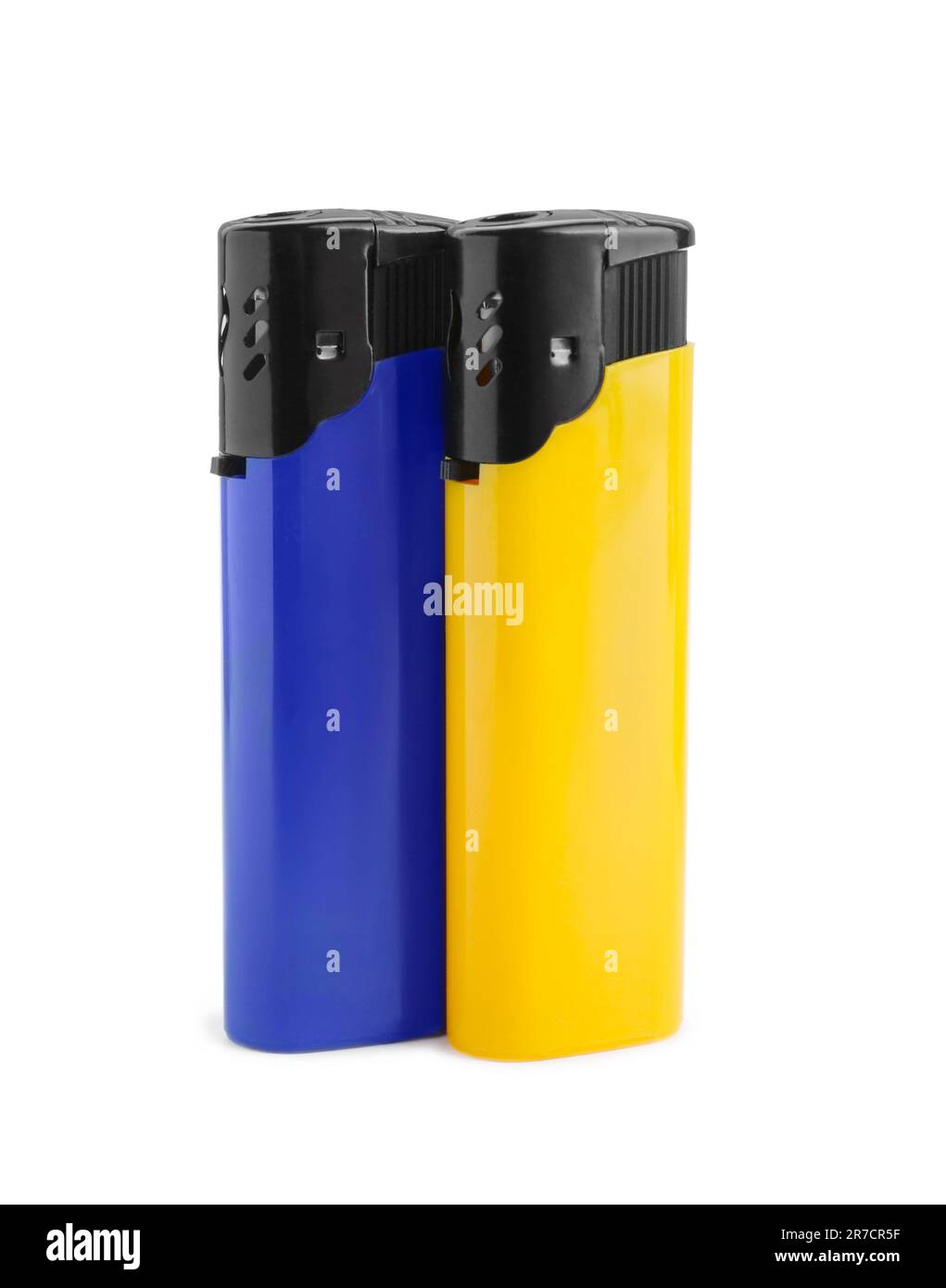 Stylish small pocket lighters on white background Stock Photo - Alamy