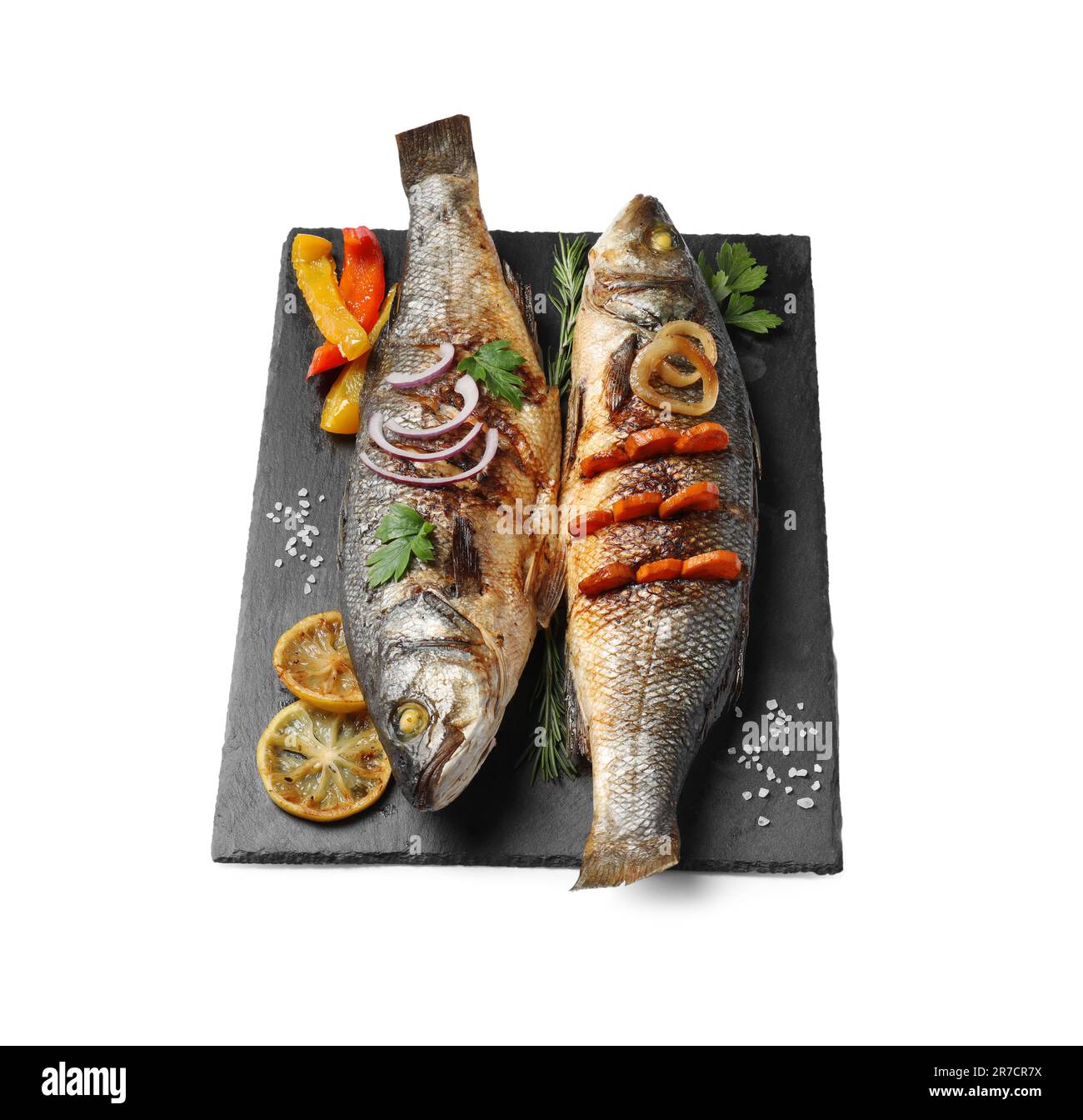 Delicious sea bass fish and ingredients isolated on white Stock Photo ...