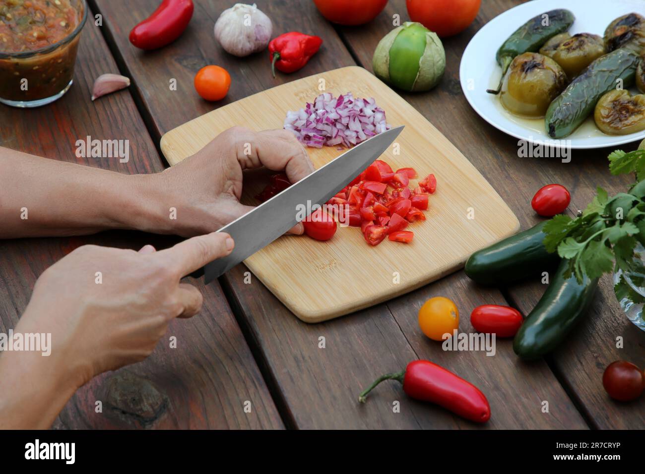 Salsa recipe woman cutting hi-res stock photography and images - Alamy
