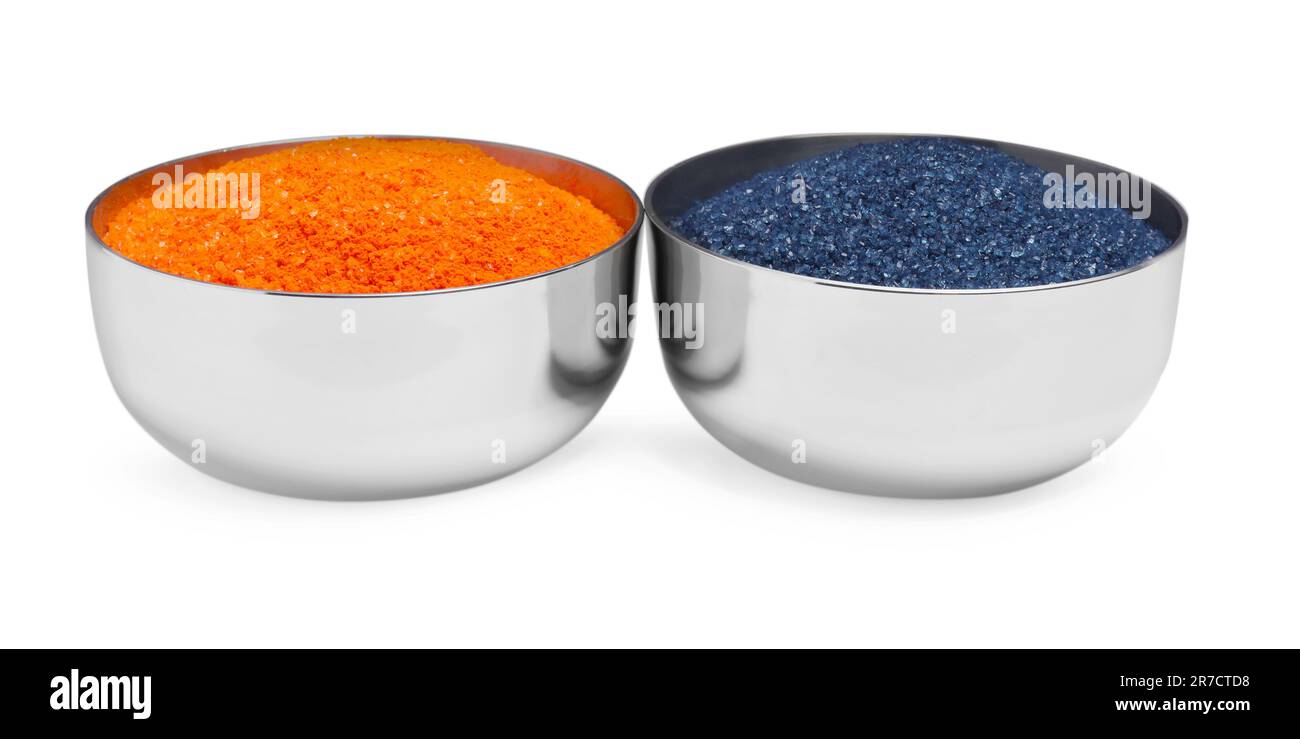 Bowls with food coloring on white background Stock Photo - Alamy