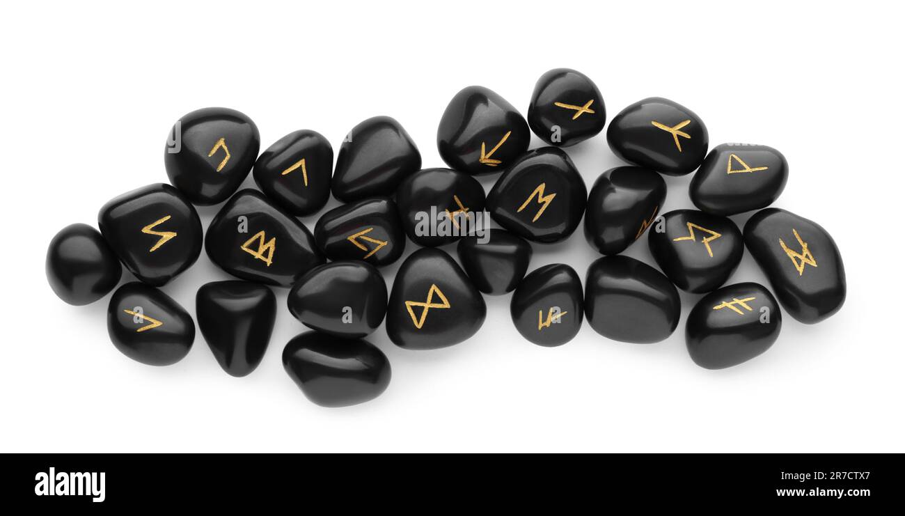 Pile of black rune stones isolated on white, top view Stock Photo - Alamy