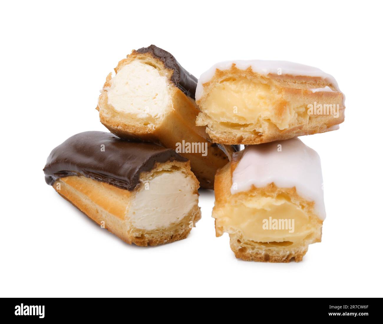 Many cut delicious eclairs isolated on white Stock Photo - Alamy