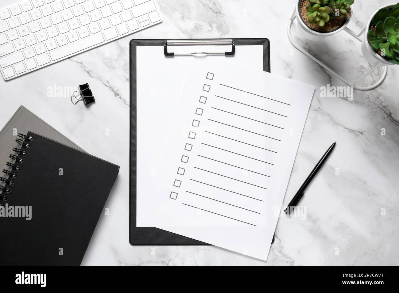 Clipboard With Inscription Checklist Computer Keyboard And Plants On
