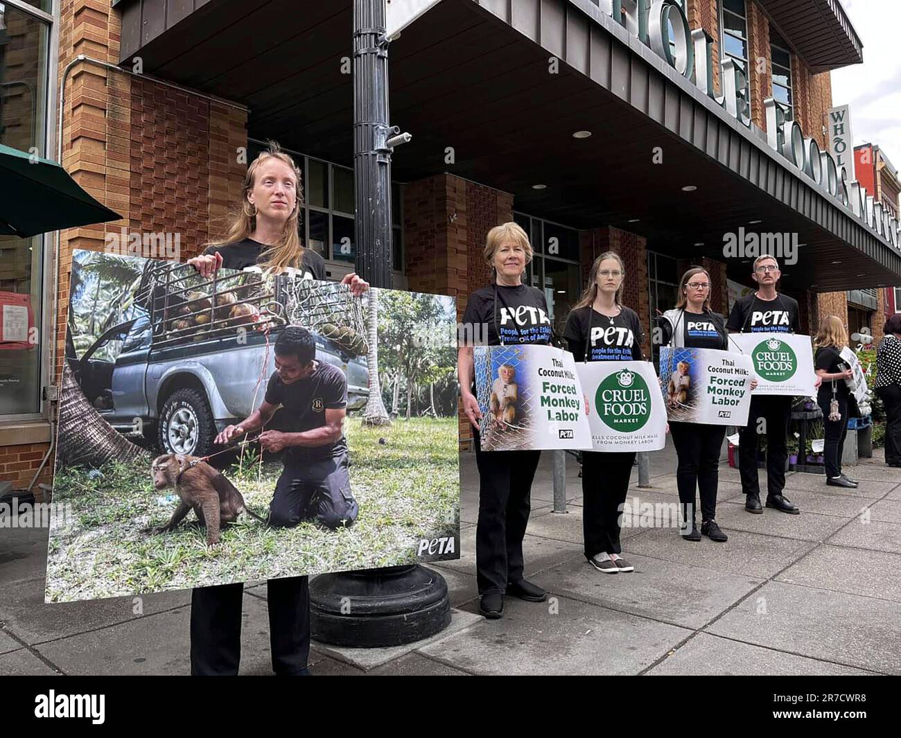 Photo by: PETA/STAR MAX/IPx 2023 6/14/23 PETA members wearing prisoner ...