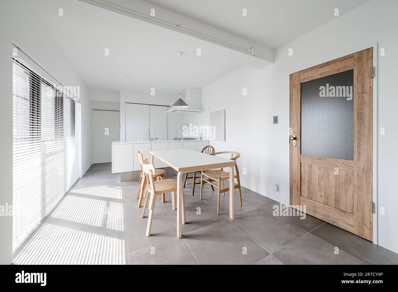 Simple modern style dining with white tone Stock Photo - Alamy