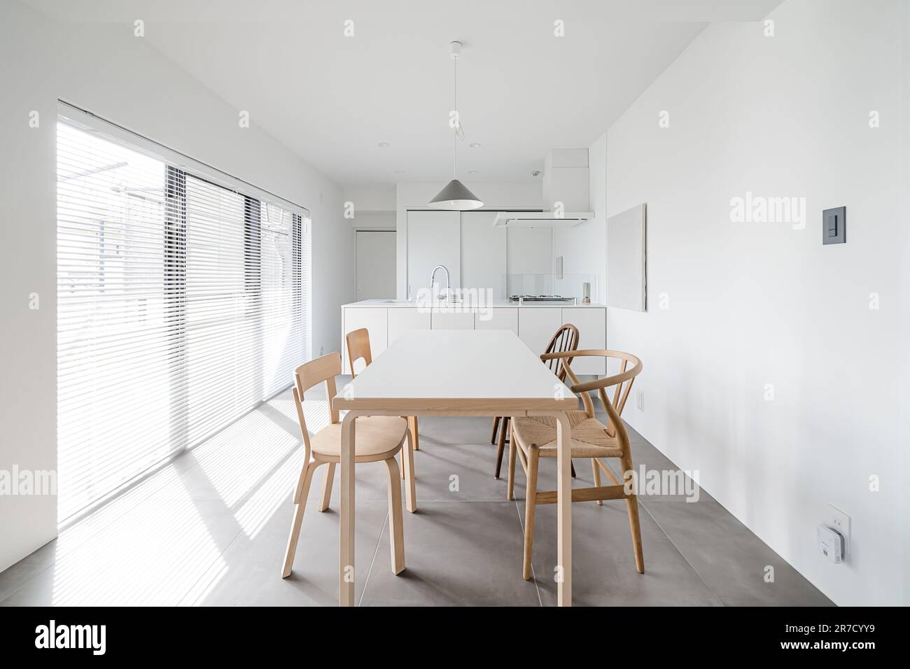 Simple modern style dining with white tone Stock Photo - Alamy