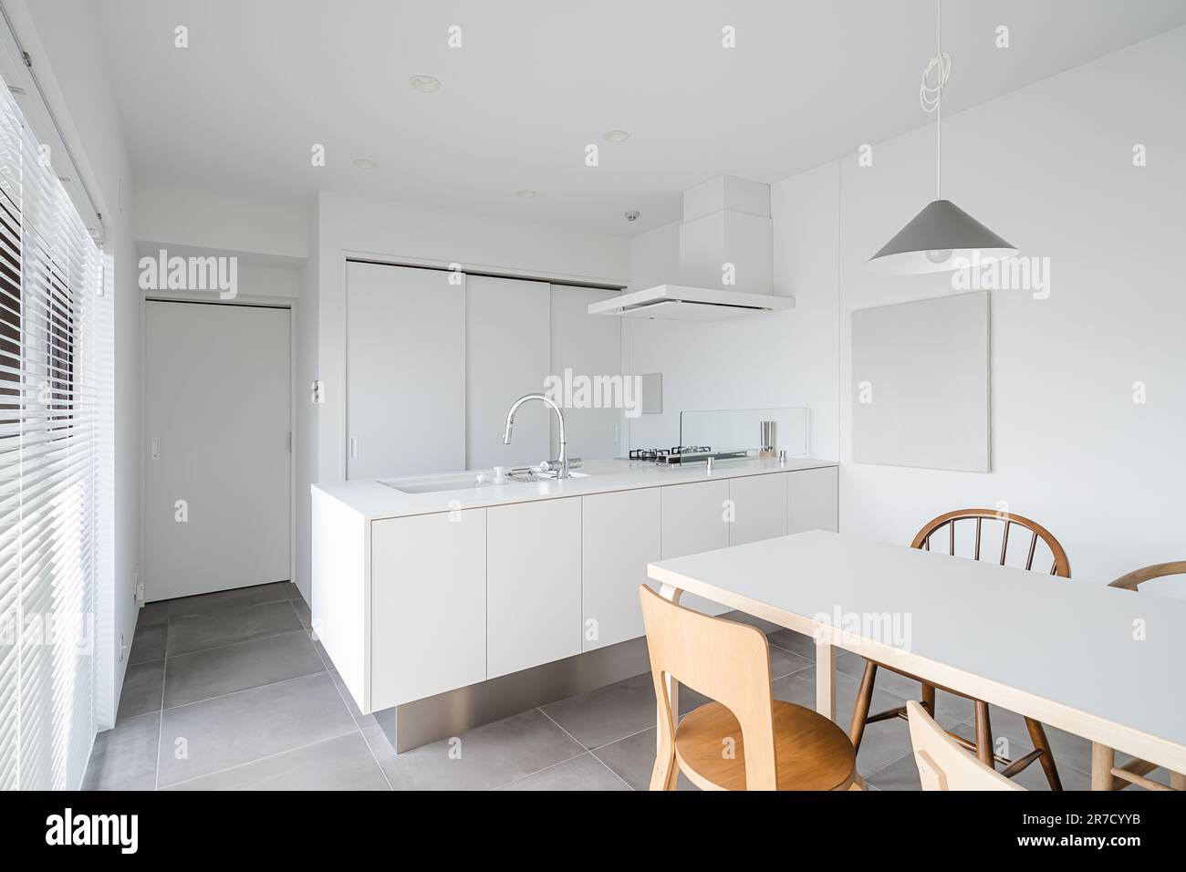Simple modern style kitchen in white Stock Photo - Alamy