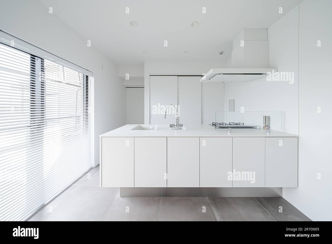 Simple modern style kitchen in white Stock Photo - Alamy