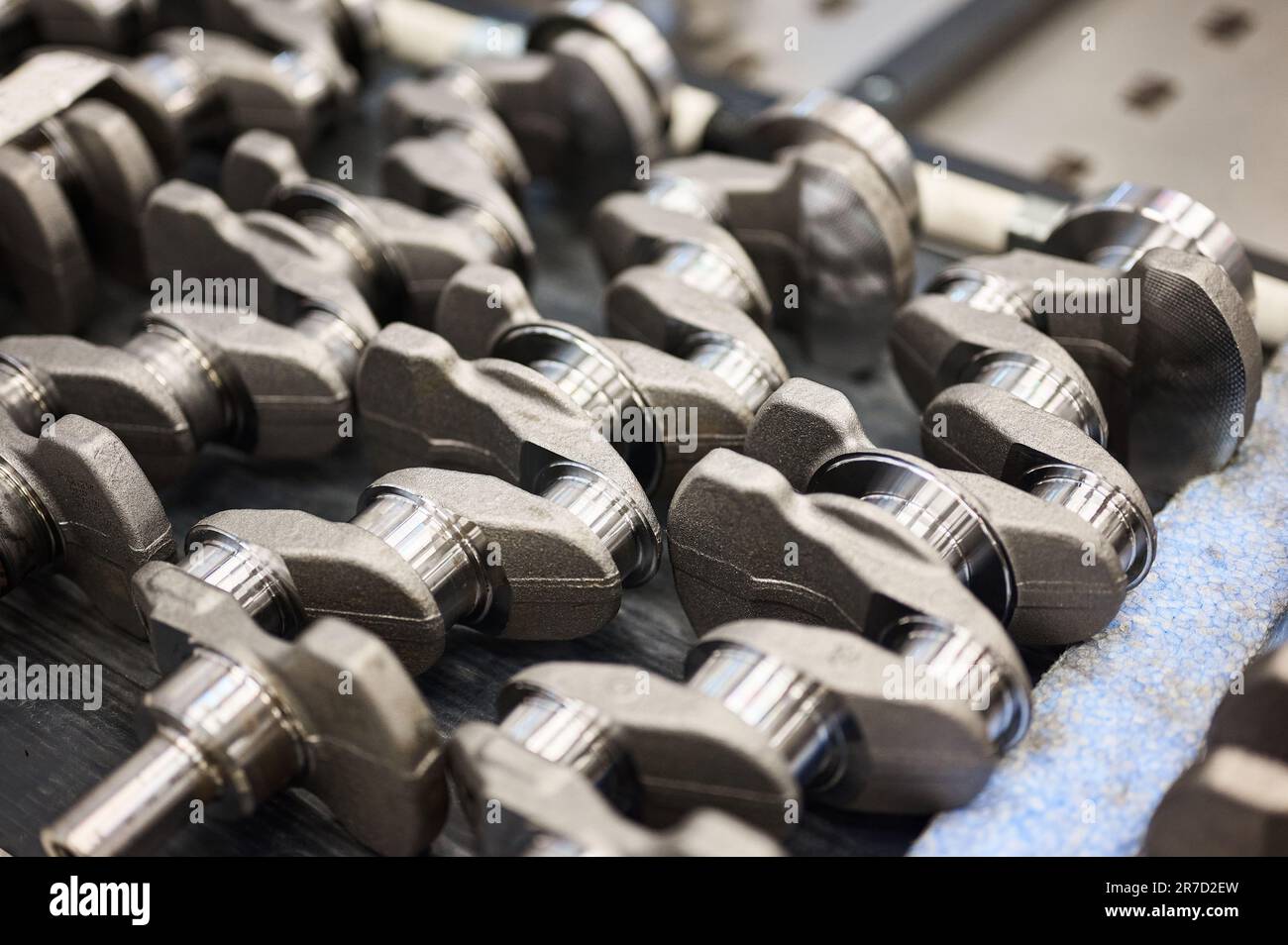 Cast steel crankshaft ready to mount on car engine closeup Stock Photo ...