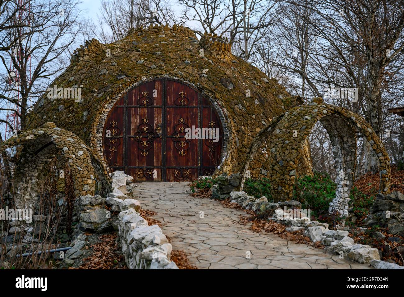 A building made of stones in the form of a hemisphere with a round ...