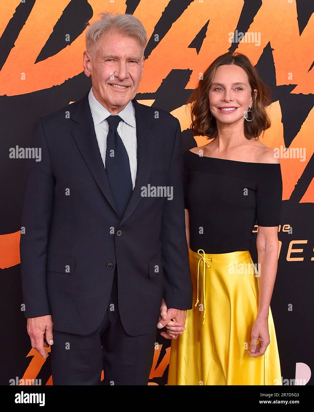 Harrison Ford, left, and Calista Flockhart arrive at the premiere of ...