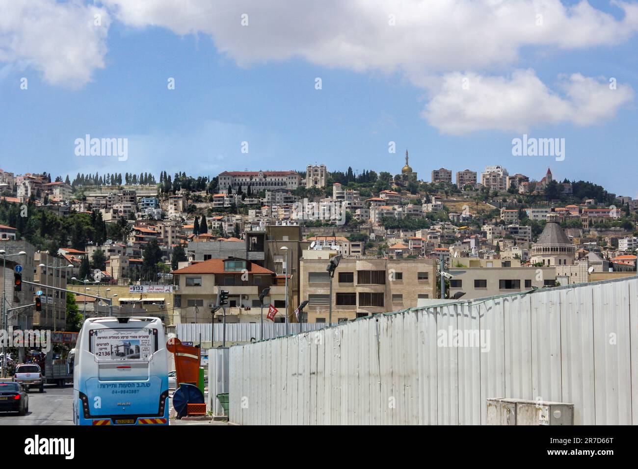 A bus approaches a hillside in Nazareth, Israel Stock Photo - Alamy
