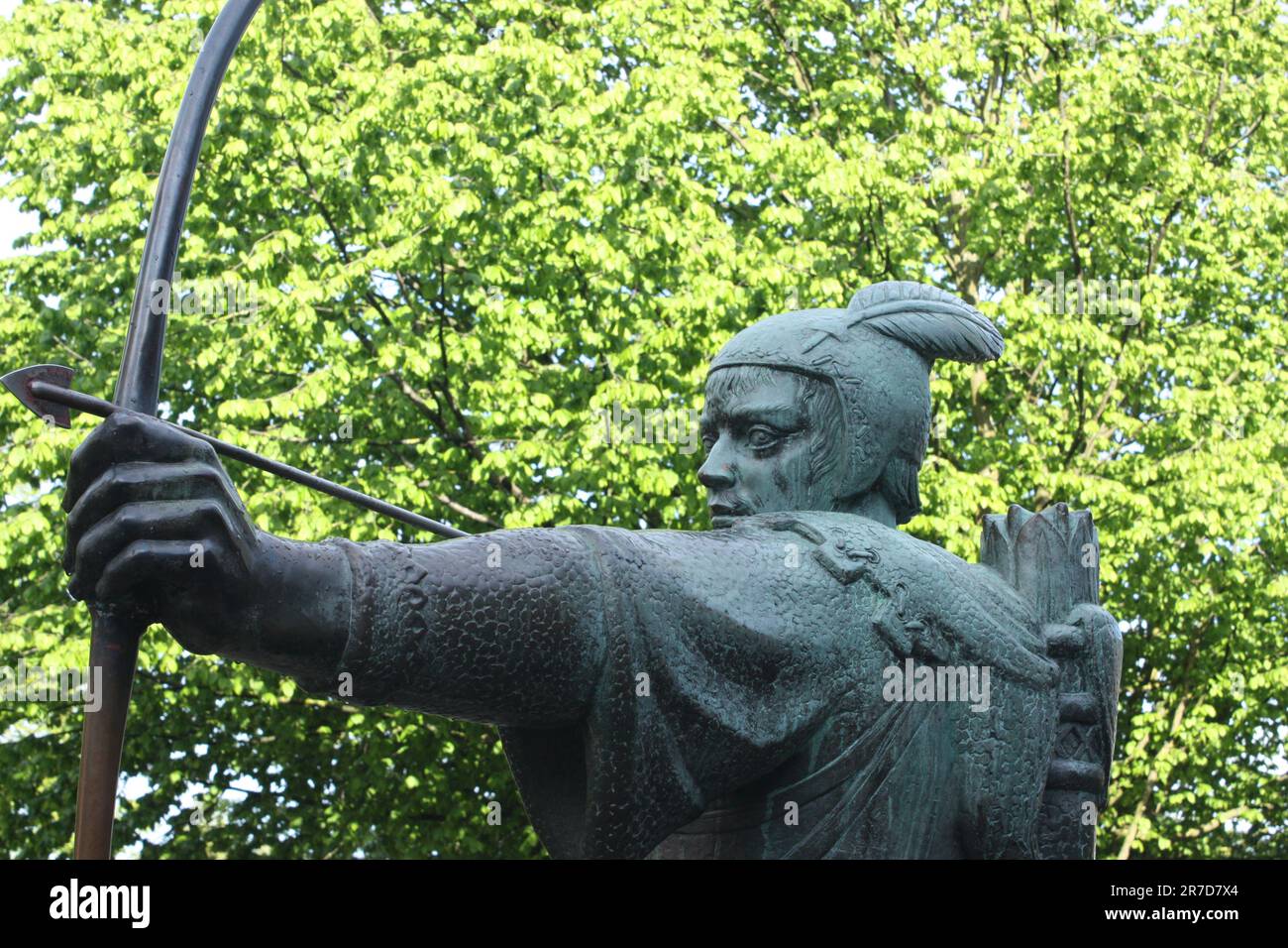 The statue of Robin Hood near the walls of the castle in Nottingham ...