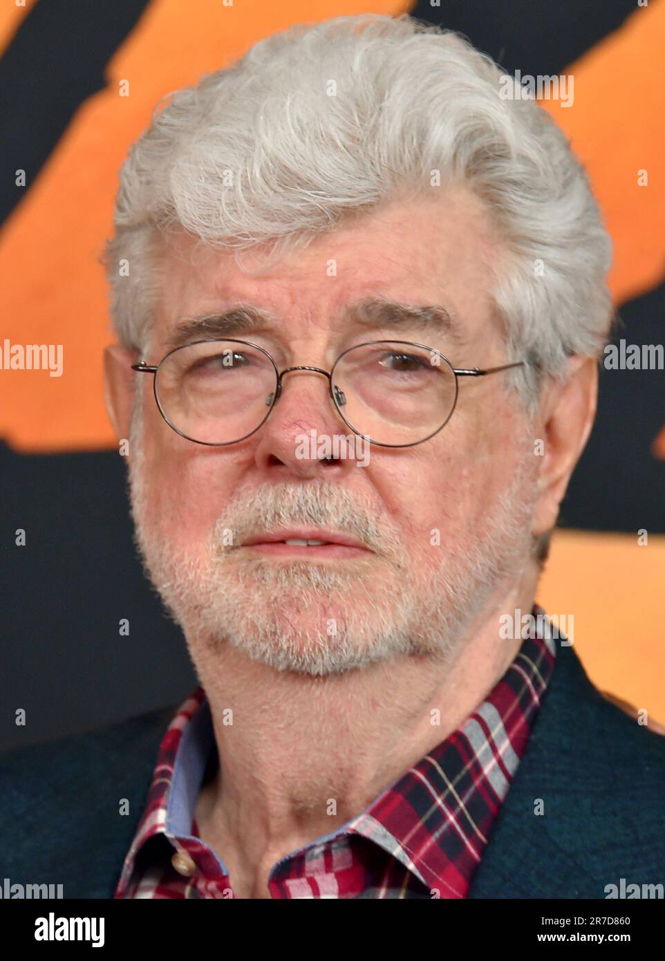 George Lucas arrives at the premiere of "Indiana Jones and the Dial of ...