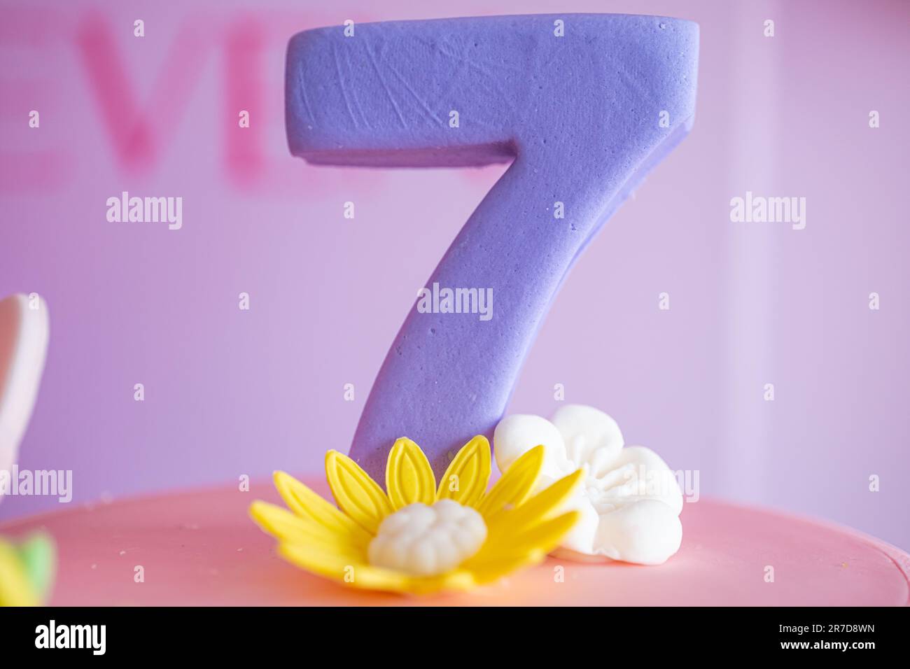 Seven year old child birthday cake ready to eat Stock Photo - Alamy