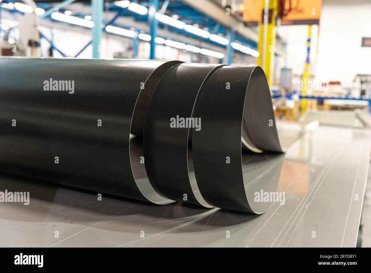 Folded Sheet metal in metal roofing factory Stock Photo - Alamy