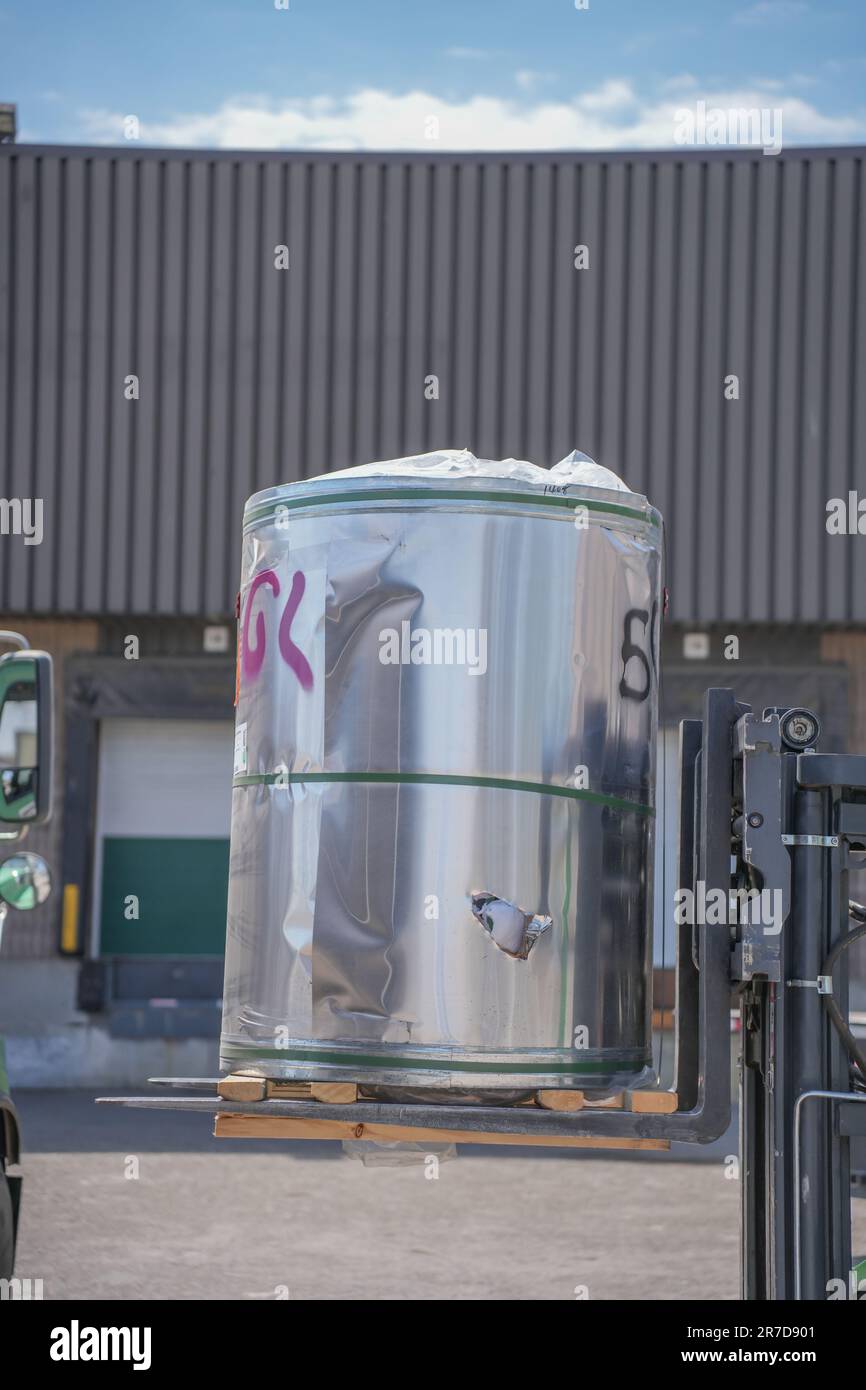 Steel metal delivered to a factory on a forklift Stock Photo - Alamy