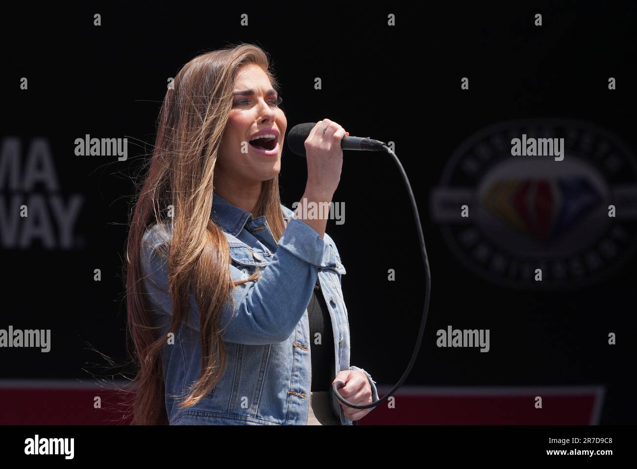 Musical artist Tiffany Woys sings The National Anthem before a NASCAR ...
