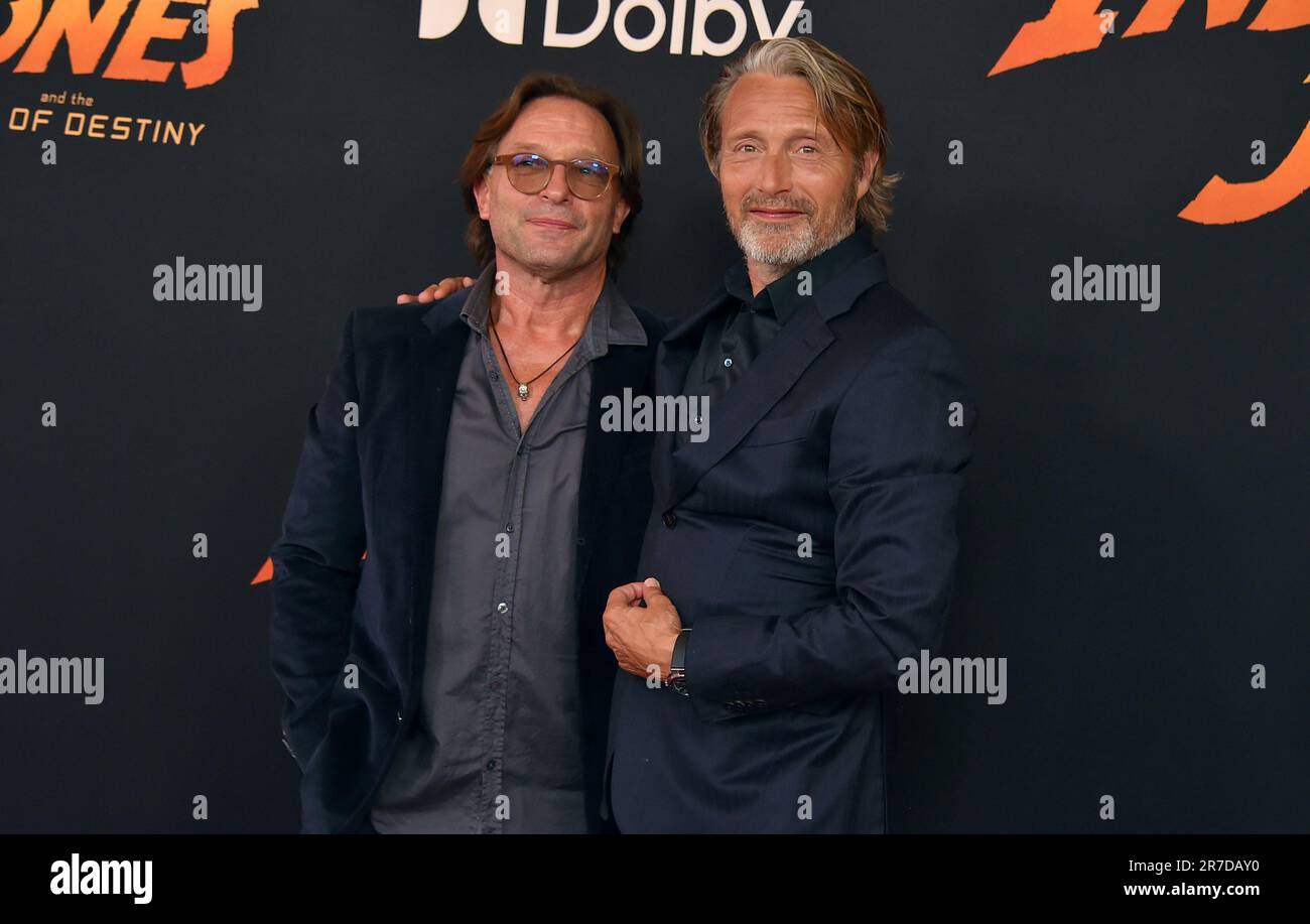 Thomas Kretschmann, left, and Mads Mikkelsen arrive at the premiere of ...