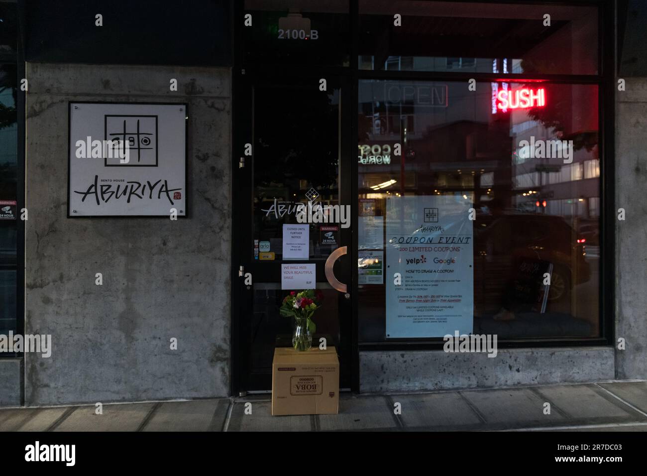 Seattle, USA. 14 Jun, 2023. A memorial outside the closed Aburiya Bento ...