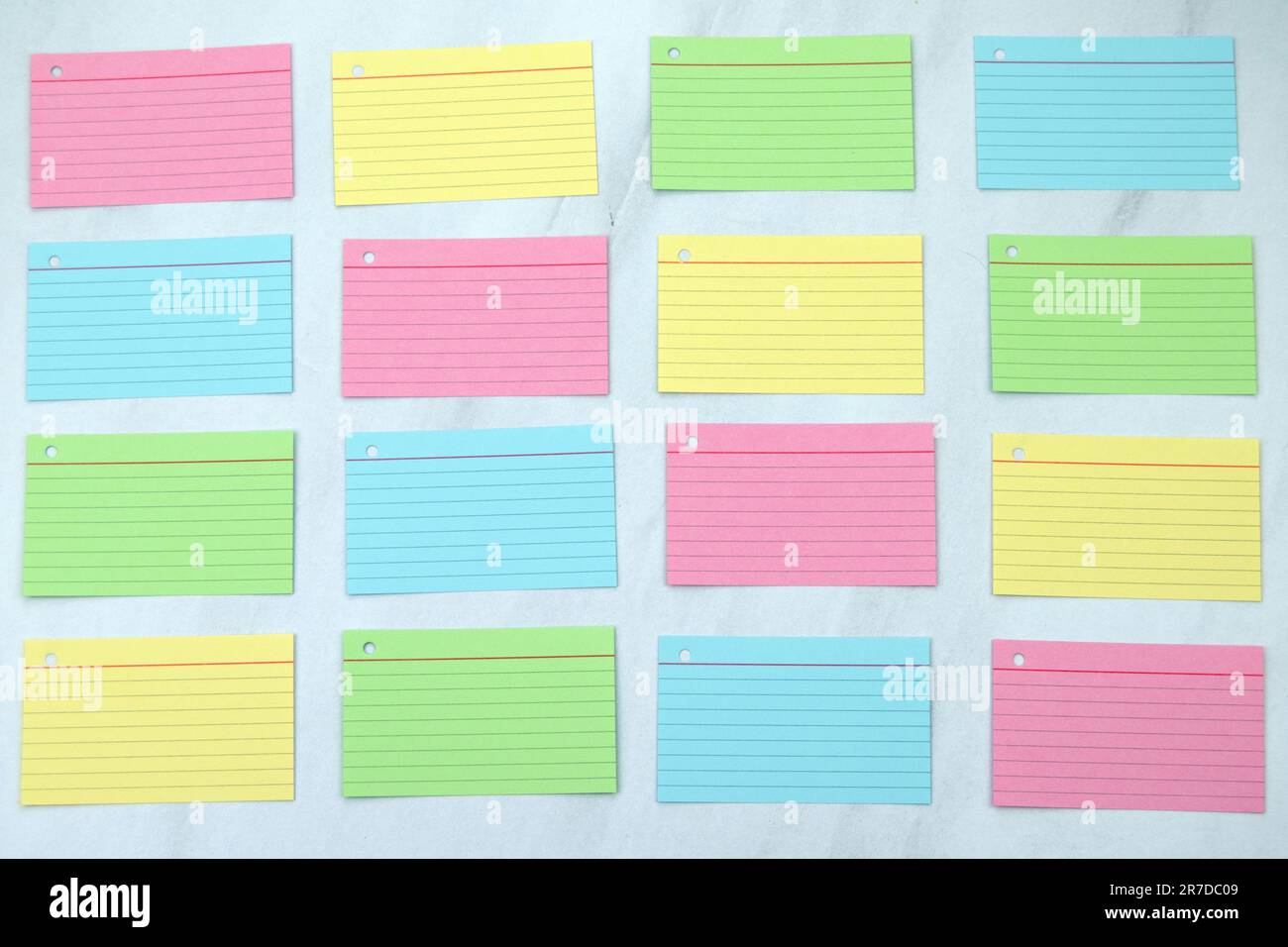 Different colour blank index cards on white background. Copy space ...