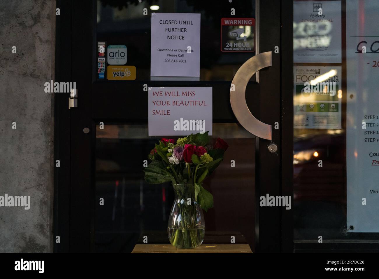 Seattle, USA. 14 Jun, 2023. A memorial outside the closed Aburiya Bento ...