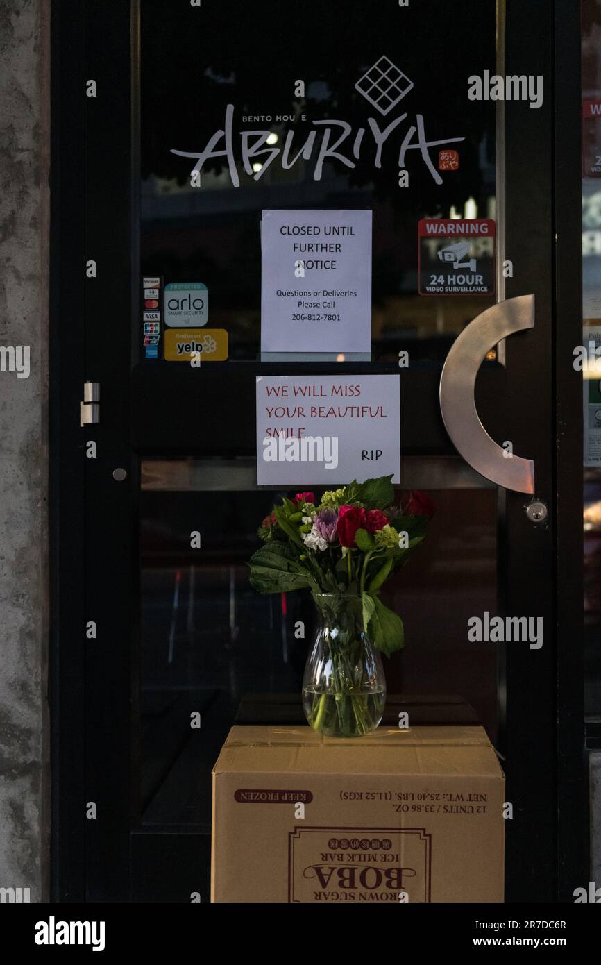 Seattle, USA. 14 Jun, 2023. A memorial outside the closed Aburiya Bento ...