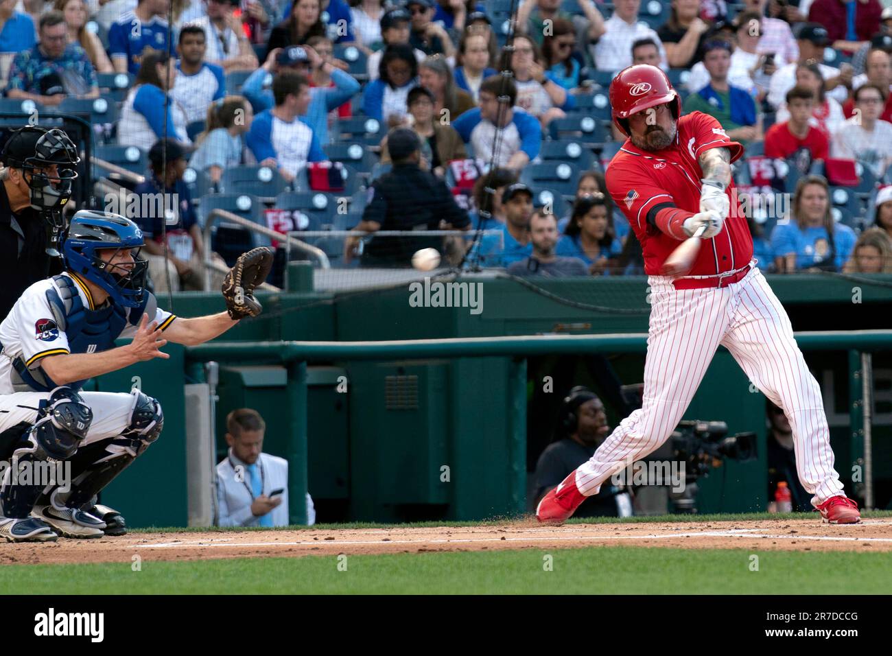 Rep. Morgan Luttrell, R-Texas, right, bat during the annual ...