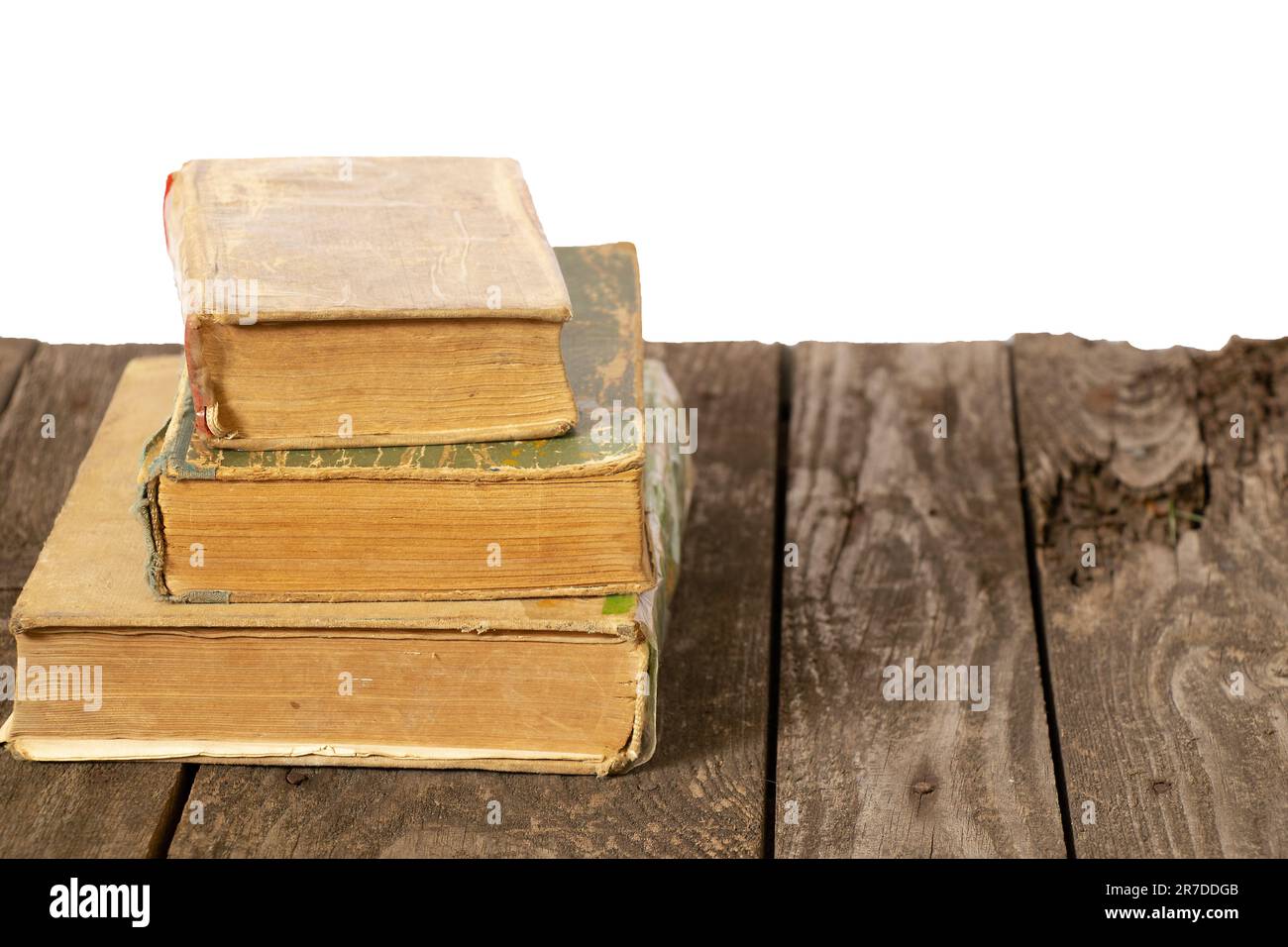 a stack of old books on an isolated background Stock Photo - Alamy