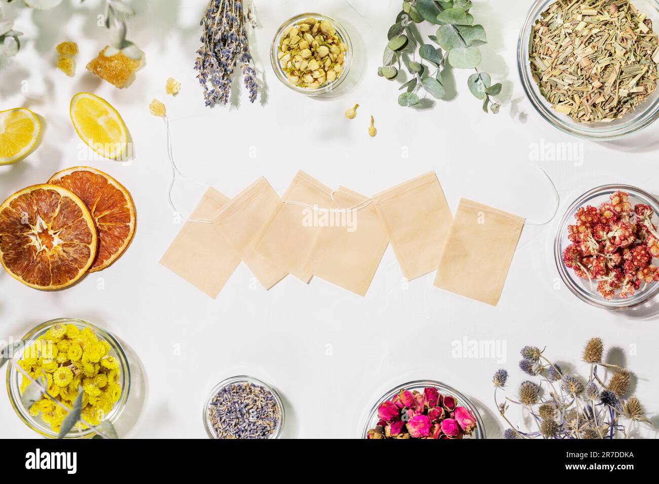 Sustainable still life with tea paper bags and dry flowers and herbs ...