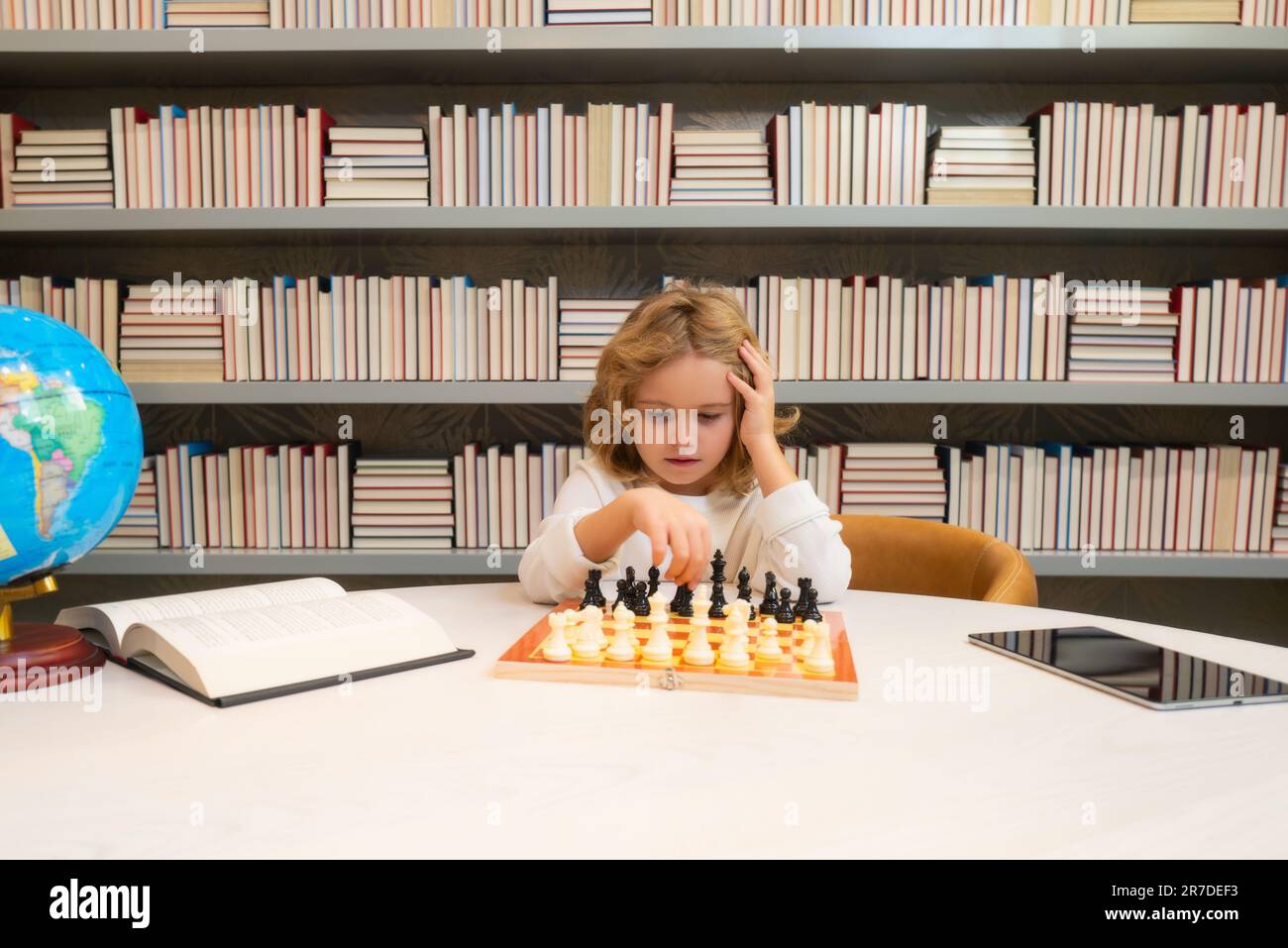 Chess school. Kid think about chess game. Child education concept ...