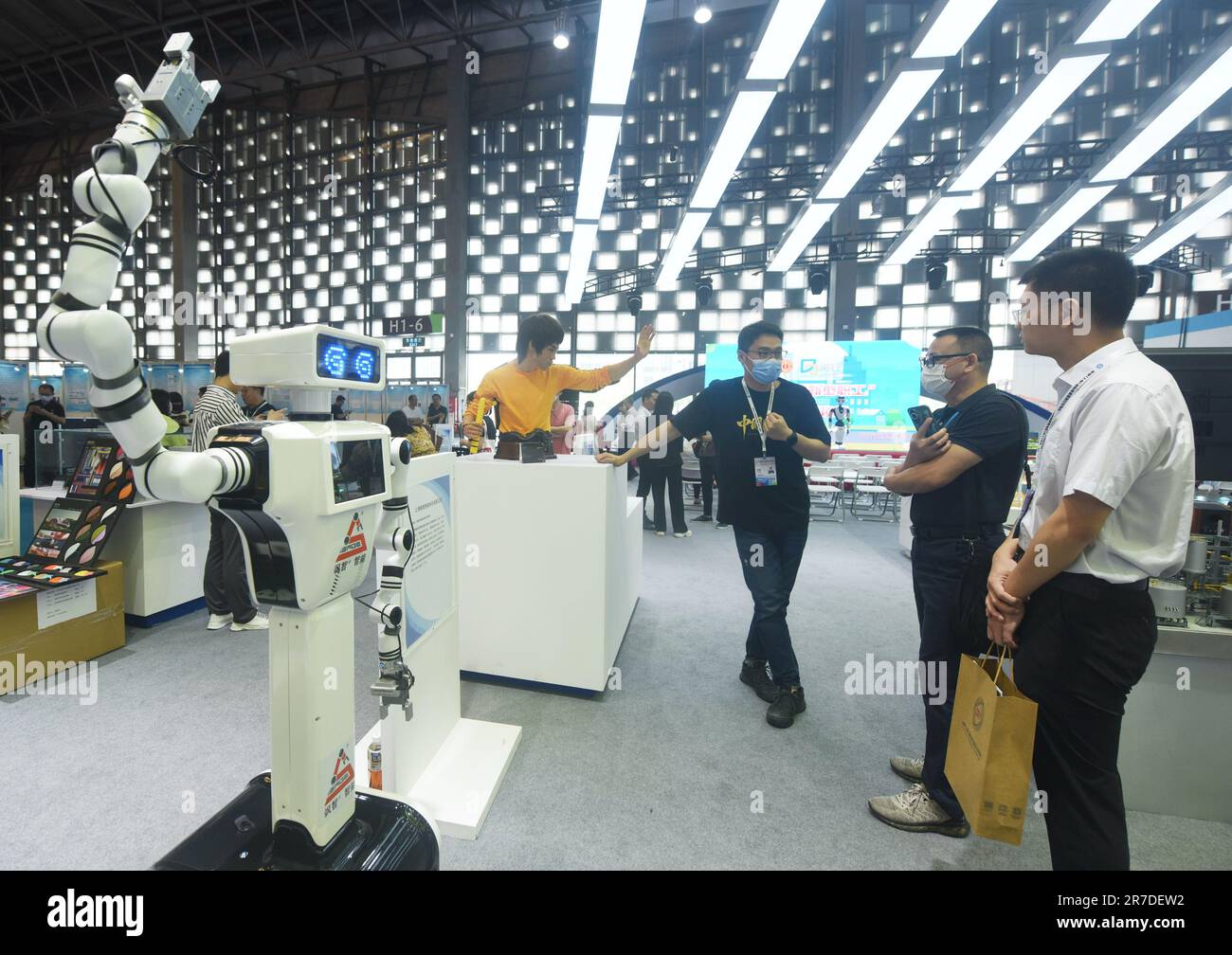 SHANGHAI, CHINA - JUNE 15, 2023 - Visitors visit intelligent two-arm ...