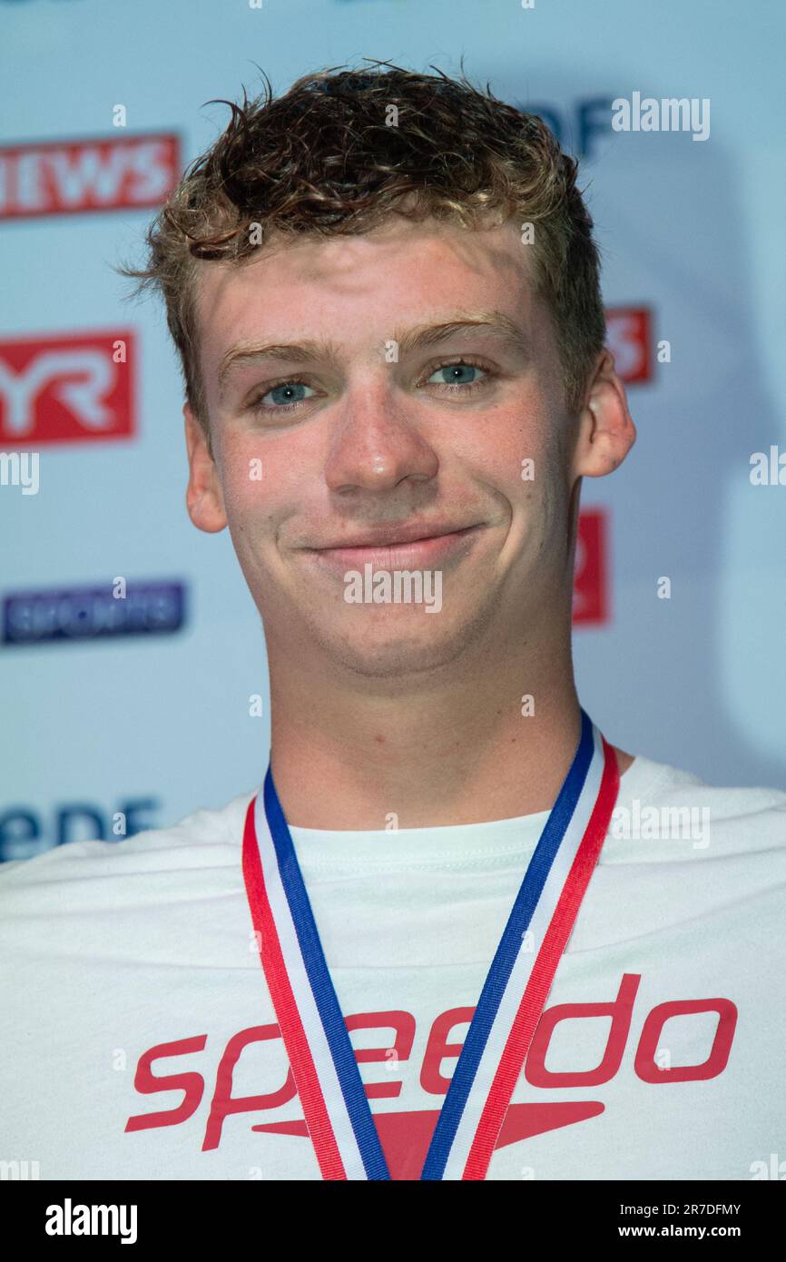 Winner Leon Marchand poses during the Swimming French National ...