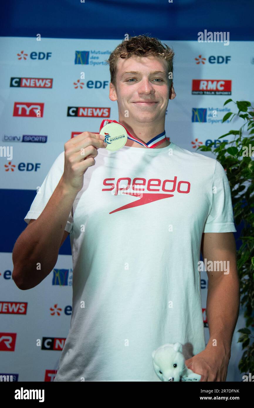 Winner Leon Marchand poses during the Swimming French National ...