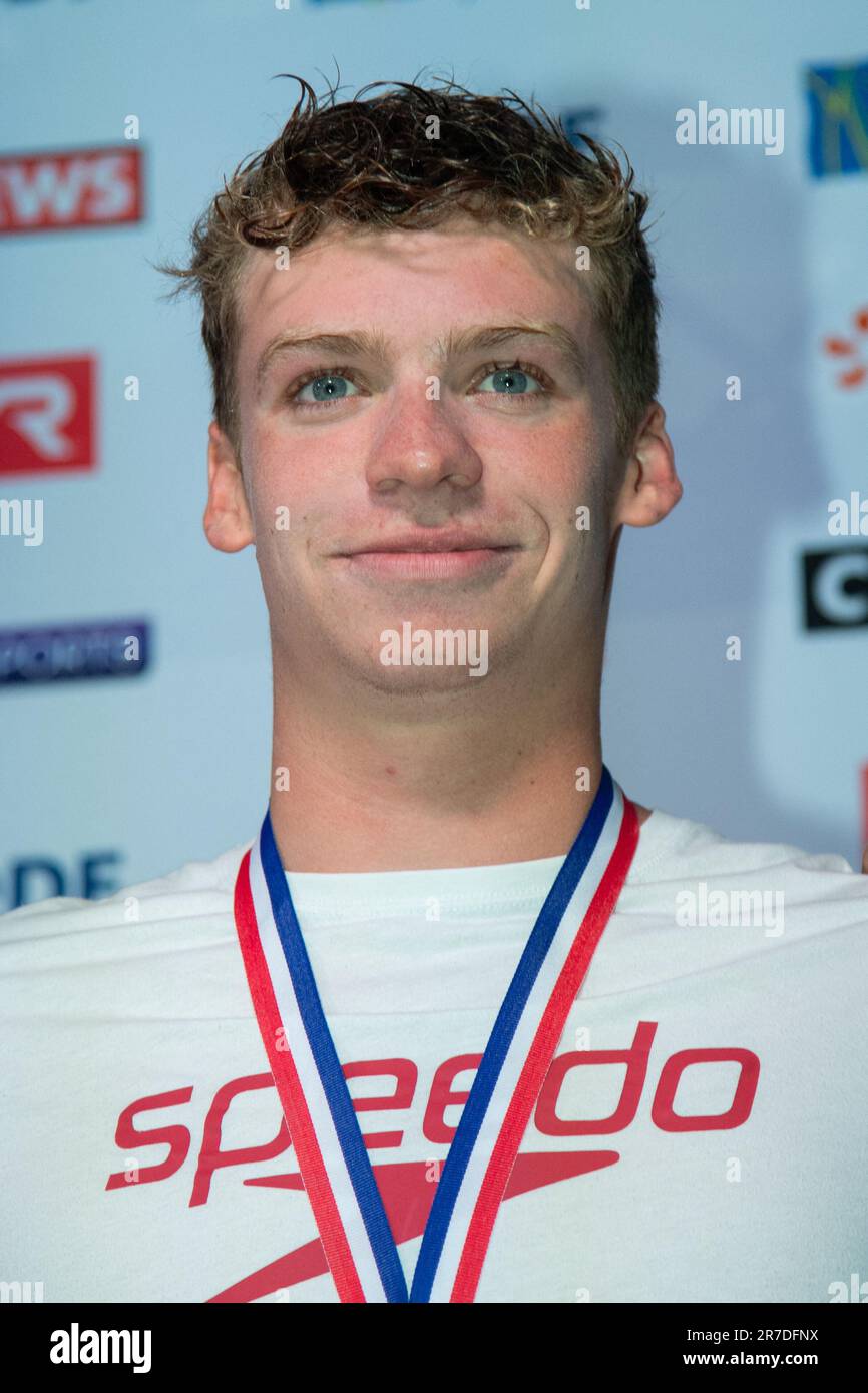 Winner Leon Marchand poses during the Swimming French National ...
