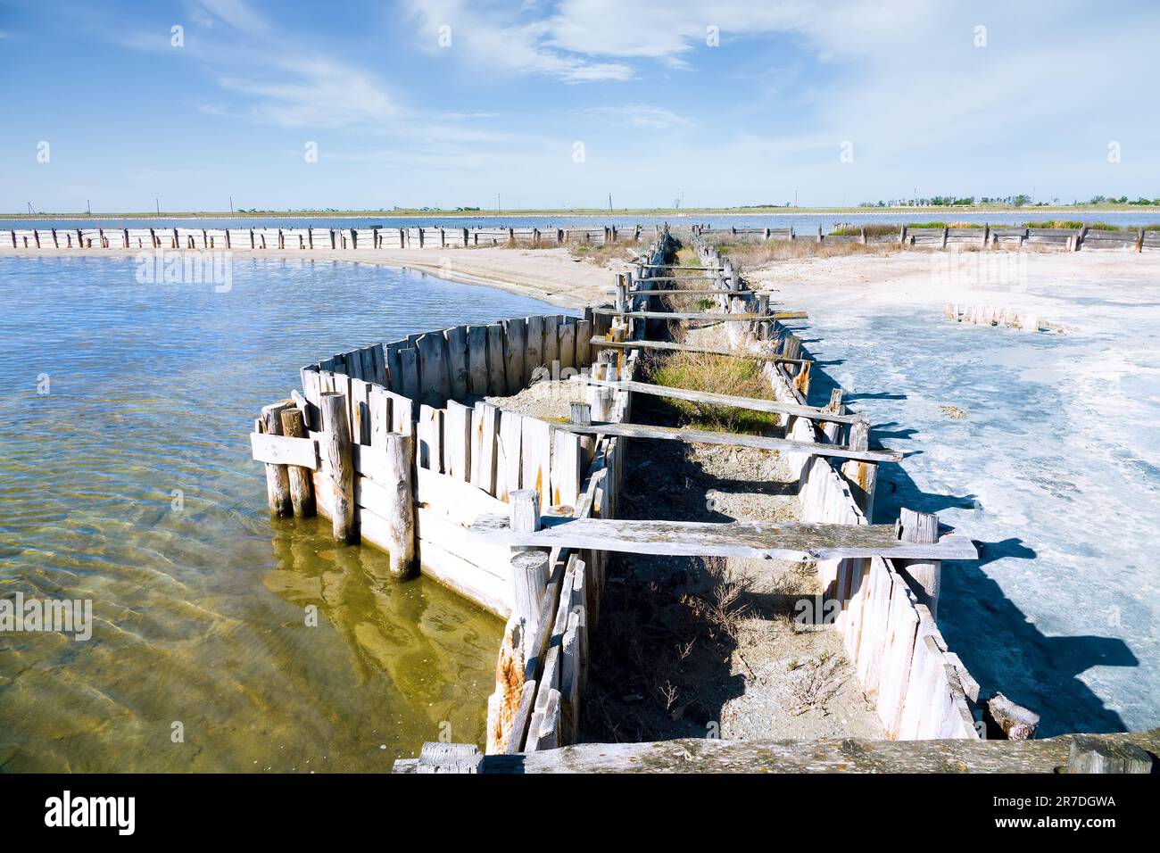An ancient abandoned salt factory, saltworks. The remains of wooden ...