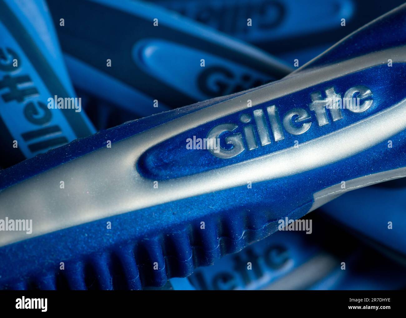 Gillette Blue logo on plastic handle for disposable razors pile close ...