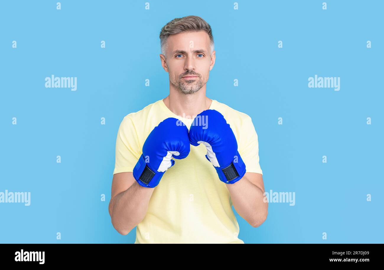 photo of sporting man boxer in sport boxing gloves. man boxer in sport ...