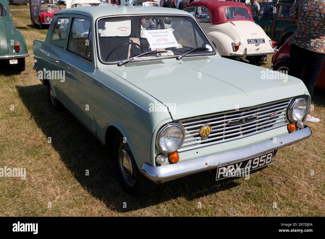 Three-quarters front view of a Green, 1964, Vauxhall Viva HA, on ...