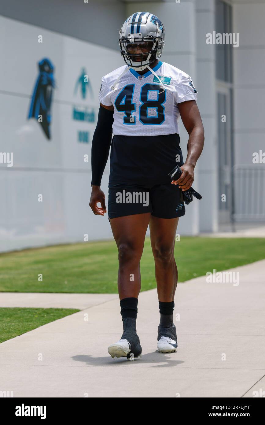 Carolina Panthers linebacker (28) Jordan Thomas (48) heads to the field ...