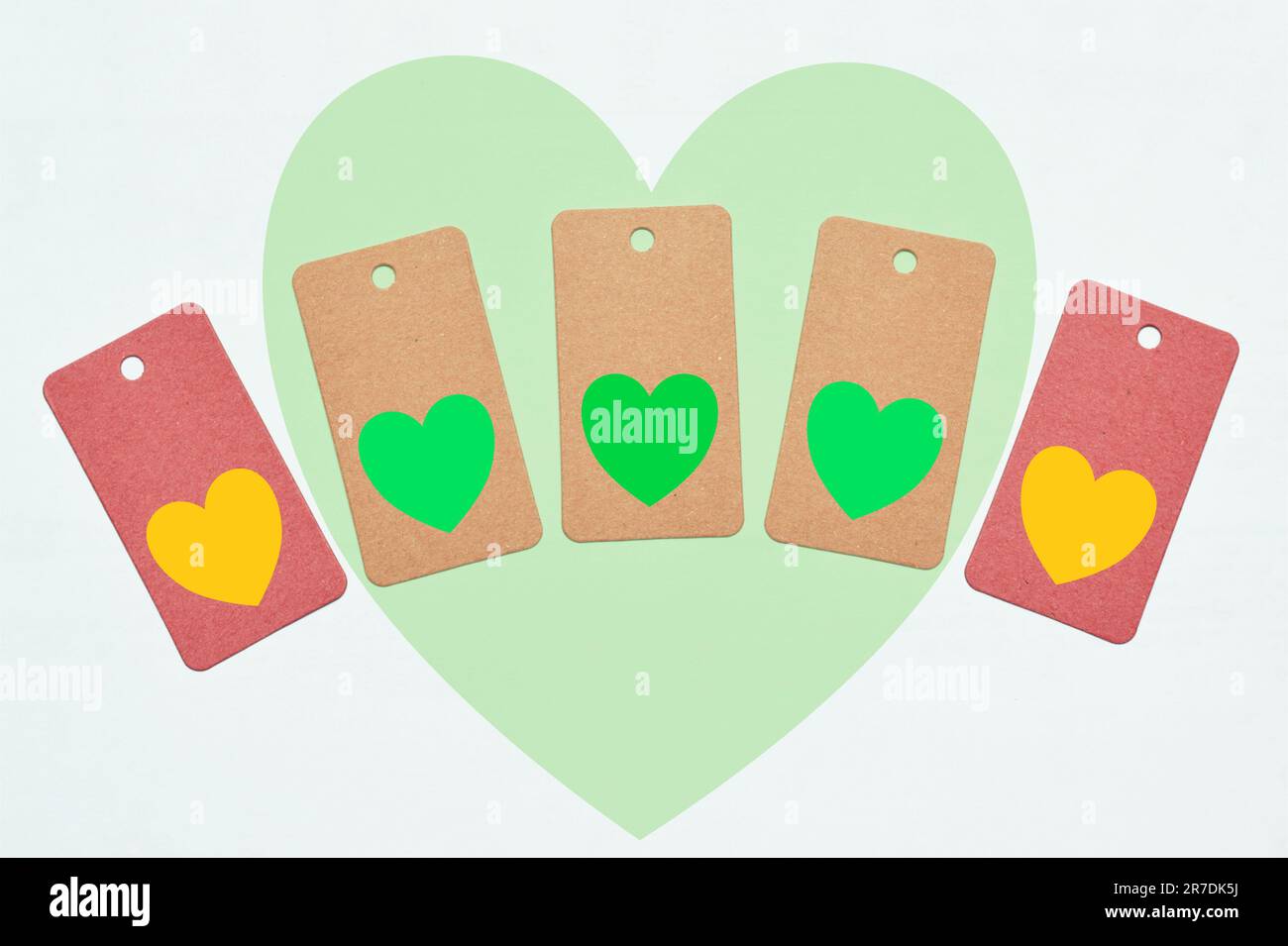 A white background with heart-shaped tags, representing love and ...