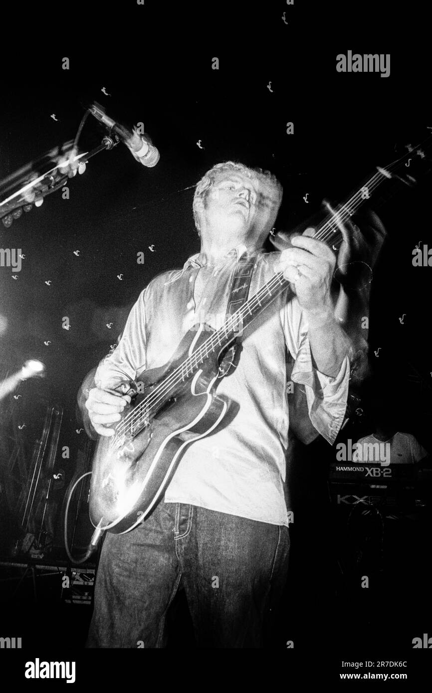Nigel Clark singer and bass player with Britpop band Dodgy playing at ...